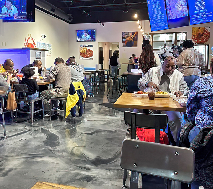 The true measure of a great seafood joint? Locals hunched over tables, focused entirely on extracting every morsel from their seafood bounty.