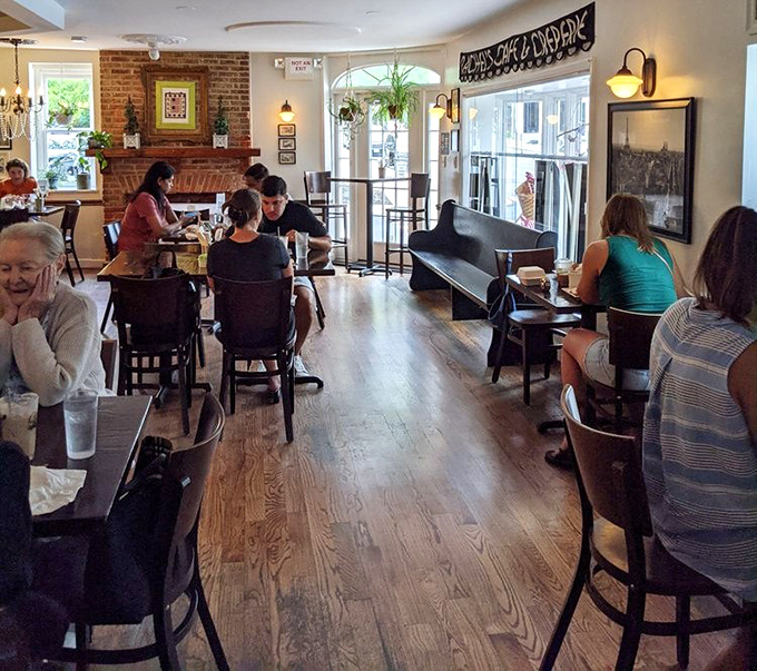 Where strangers become friends over thin pancakes. The bustling dining room hums with the satisfied murmurs of happy eaters.