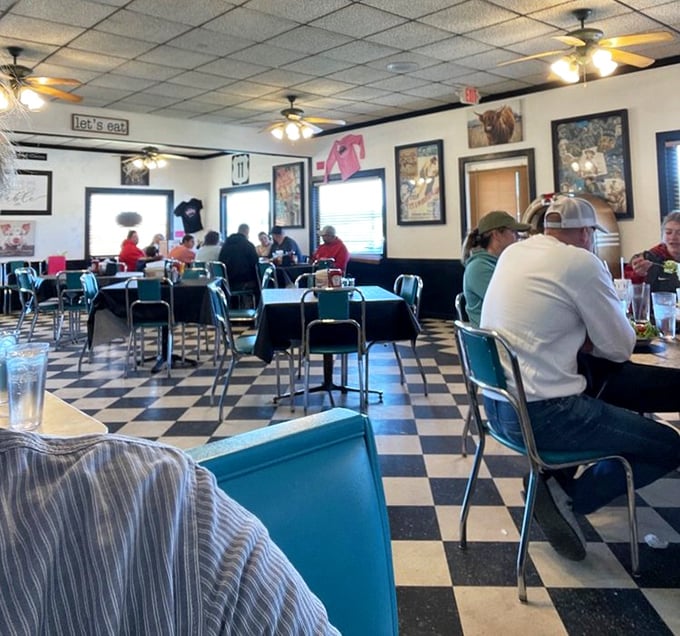 Every table tells a story. The diner buzzes with conversation as locals and travelers alike bond over the universal language of comfort food.