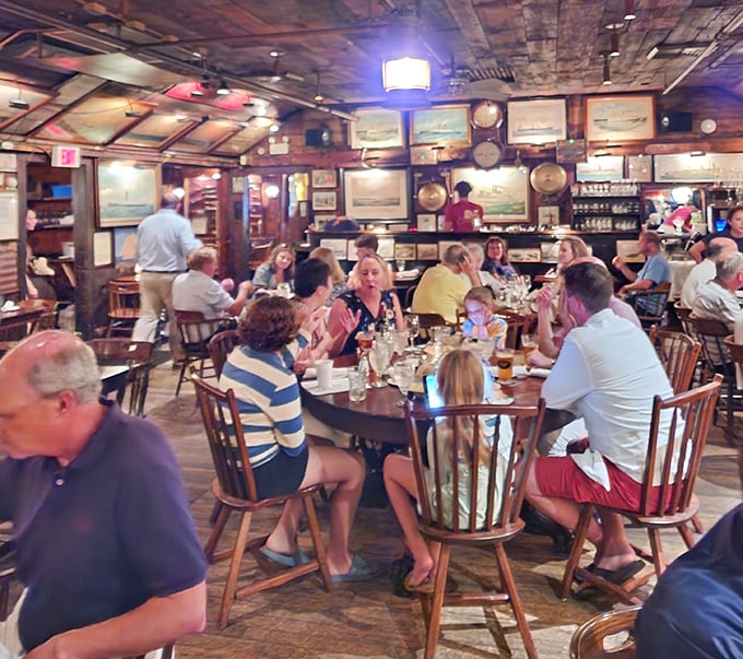 The dining room buzzes with conversation and clinking glasses, as generations gather around tables where their ancestors might have once shared meals.