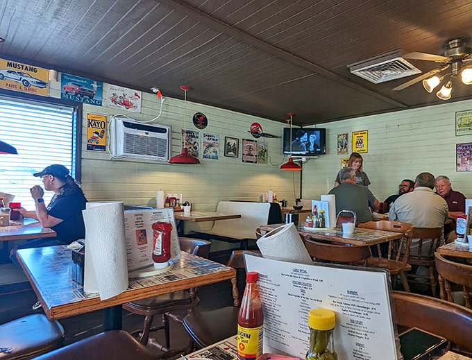 No Edison bulbs or reclaimed wood here&mdash;just honest booths, tables covered with local ads, and conversations that matter.