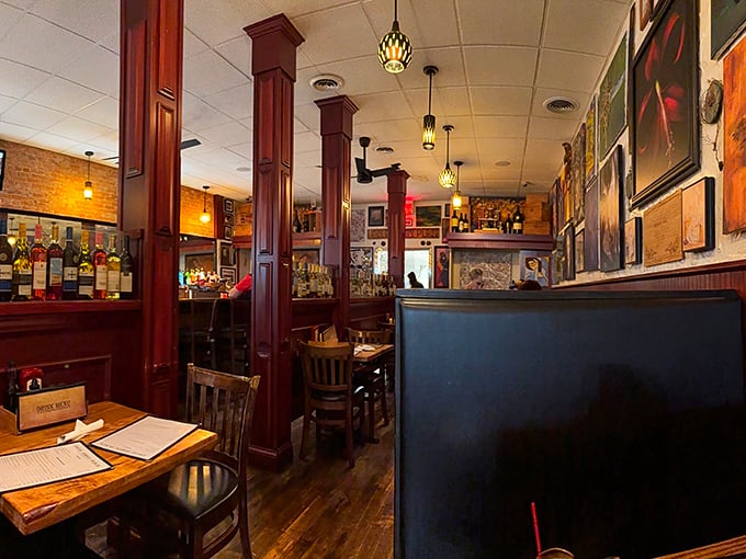 The warm glow of pendant lights illuminates a space where memories are made between bites of exceptional food.