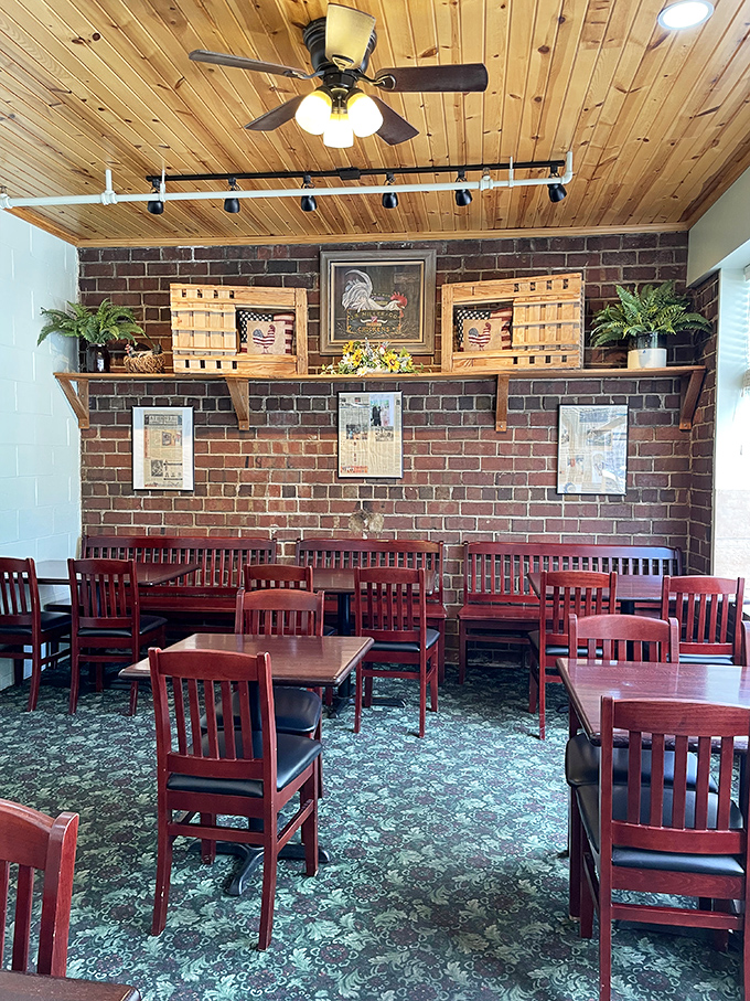 The warm wooden ceiling and brick wall create a timeless backdrop for countless Athens meals. Some design trends come and go; comfort stays forever. 