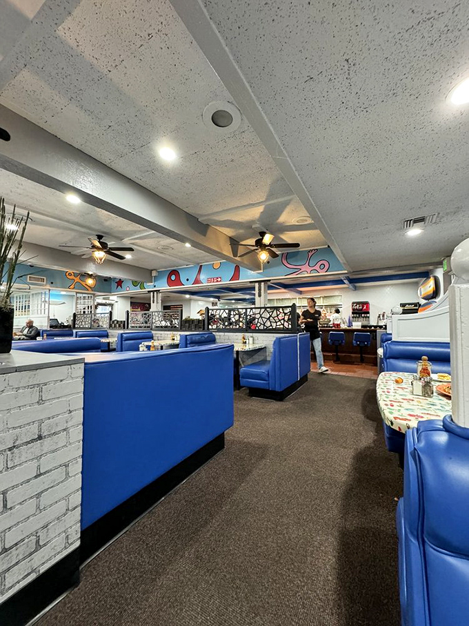 The dining room's blue ceiling beams and booth dividers create that perfect "I've discovered something special" atmosphere.