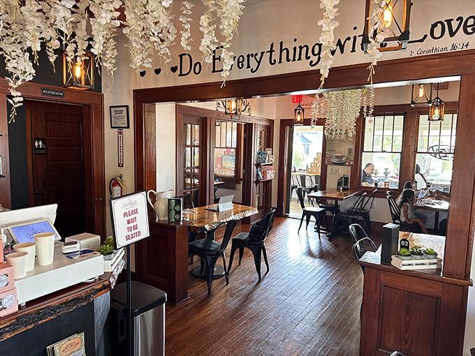 "Do Everything with Love" isn't just wall decor&mdash;it's the philosophy that flavors every bite in this warmly wooden, flower-adorned dining room.