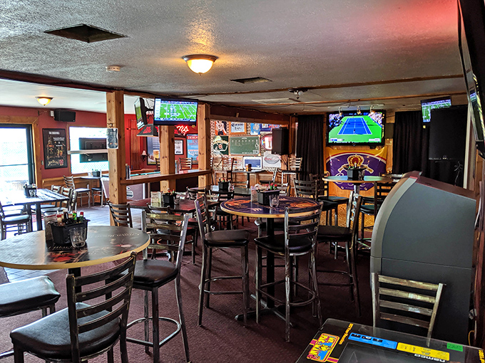 The dining area speaks the universal language of comfort&mdash;TVs for game day, sturdy tables for serious eating, and no rush to leave.