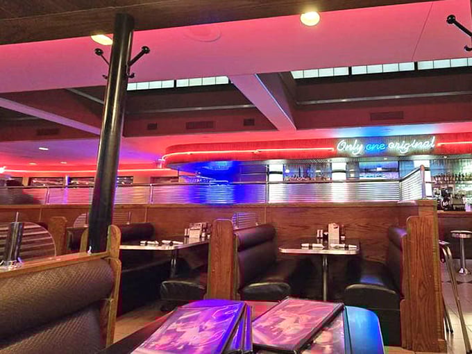 The glow of neon transforms ordinary booths into time machines. "Only one only you"&mdash;a reminder that diners, like good meals, are about connection.