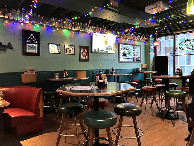 The dining area hums with conversation under festive lights. Every table holds the promise of memorable meals and the occasional tall tale.