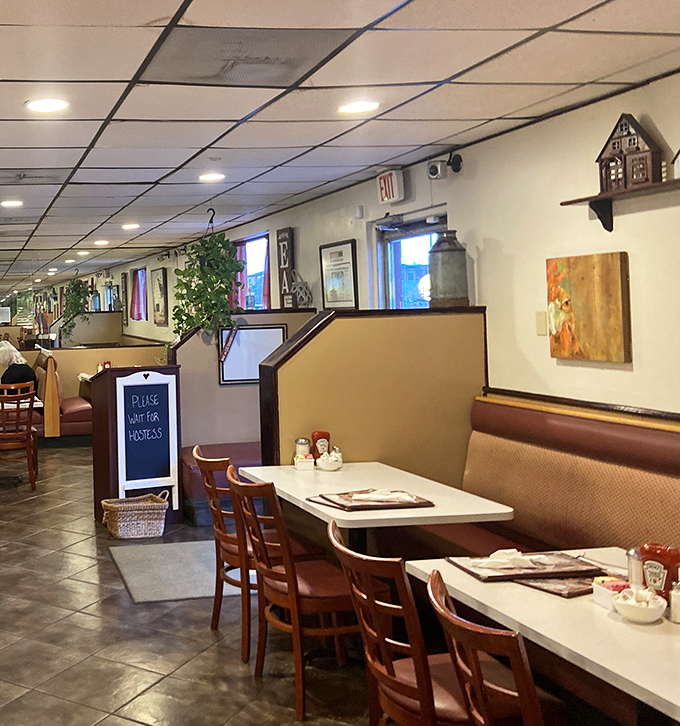 The dining area's warm wooden chairs and clean tables say, "Stay awhile, have another cup, there's no rush in the kingdom of breakfast."