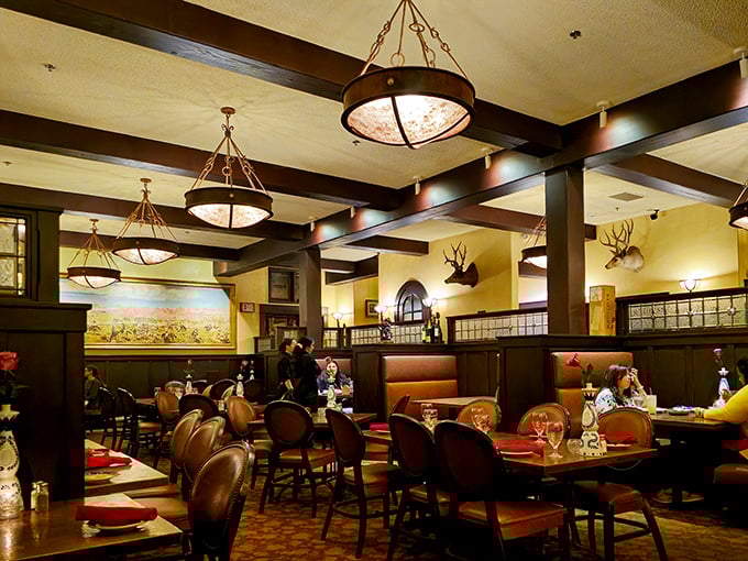 Dining under antler chandeliers and exposed beams feels like you've wandered into a sophisticated hunter's lodge where calories don't count.