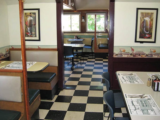 The checkerboard floor and classic booth setup aren't retro by design &ndash; they're authentic by survival, a diner that got it right the first time.