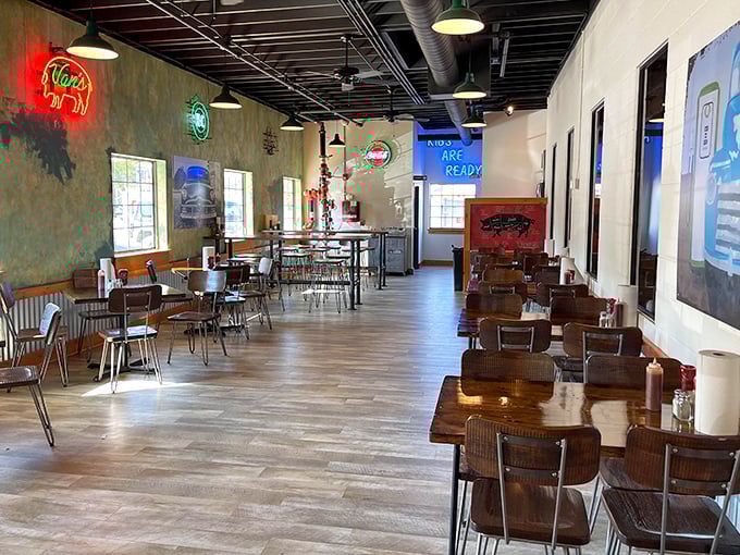 The dining area feels like barbecue's living room&mdash;neon signs glowing, tables waiting for the next round of sauce-stained napkins and satisfied smiles.