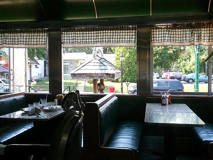 Green vinyl booths facing those iconic windows where you can watch Hatboro wake up with your breakfast.