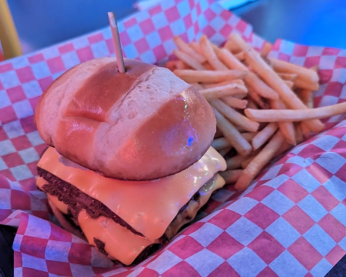 This double bacon cheeseburger isn't just lunch&mdash;it's a commitment, a relationship, and possibly the reason stretchy pants were invented.