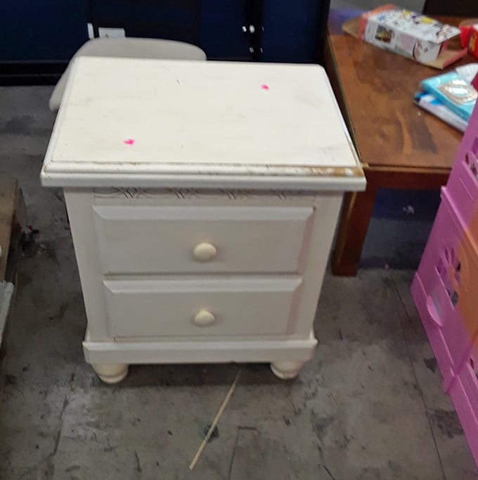 Shabby chic waiting to happen. With a little paint and new knobs, this nightstand could star in a home makeover show.