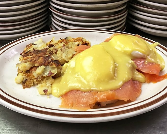 Eggs Benedict that belongs in the breakfast hall of fame. That hollandaise sauce cascading over smoked salmon is pure morning poetry.