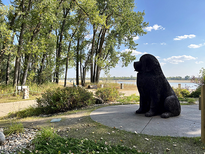 Even the statues in Washburn know how to appreciate a good view. This faithful companion keeps watch over the Missouri's gentle flow.