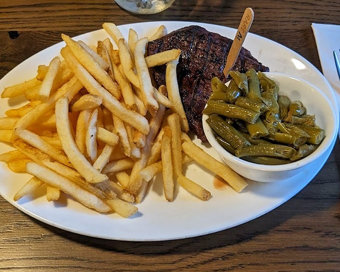 A steak that needed no introduction, but got one anyway with that little wooden marker. The fries aren't just a side&mdash;they're co-stars.
