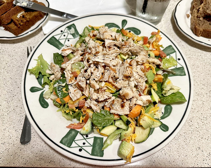 A salad that actually satisfies! Fresh greens playing host to a party of grilled chicken and colorful vegetables. No rabbit food jokes necessary.