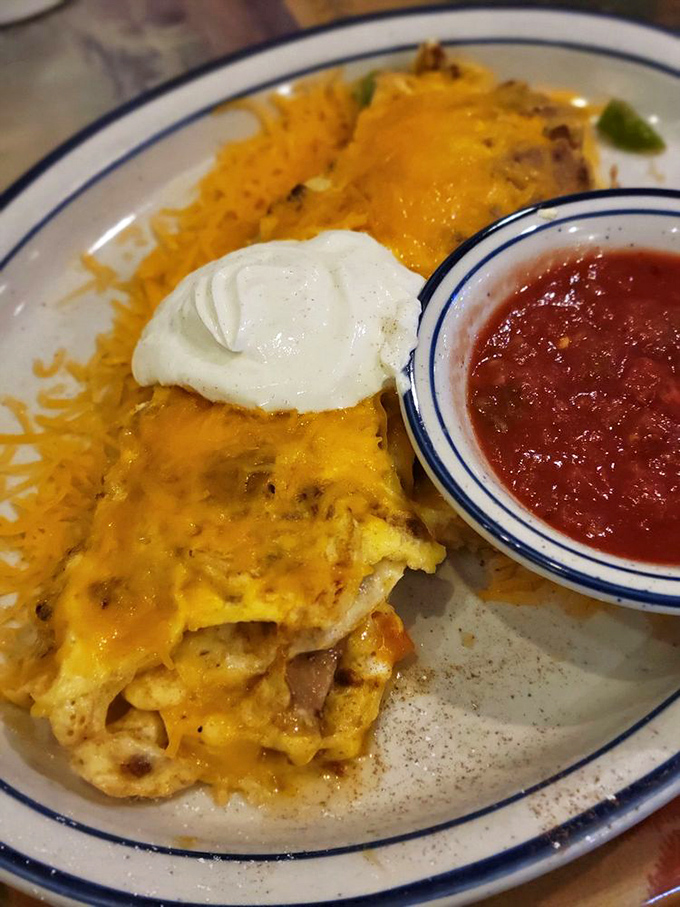 This isn't just an omelet&mdash;it's a fiesta wrapped in eggs, smothered in cheese, with salsa standing by for the after-party.