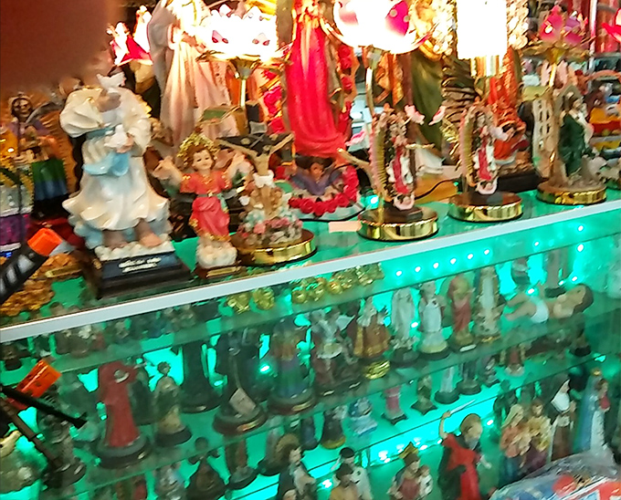 An army of illuminated figurines stands at attention. One person's kitsch is another's cherished collection&mdash;that's the beauty of flea markets.