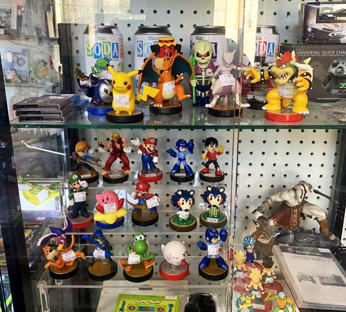 Video game characters frozen in time. Mario and Pikachu standing guard over childhood memories that now qualify as collectibles.