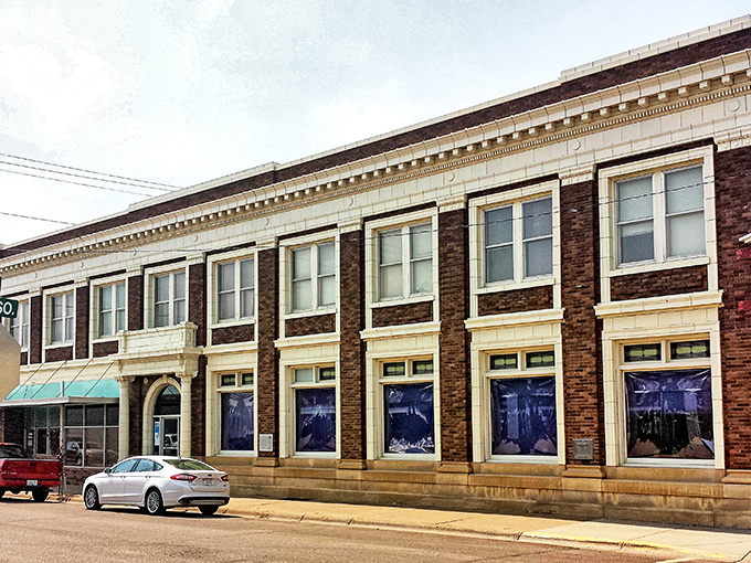 First National Bank's two-tone brick facade brings architectural character to downtown, standing tall like a financial guardian.