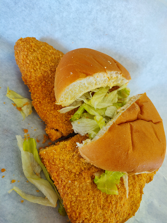 A tenderloin sandwich with a side of chili—proof that sometimes the best dining companions are the simplest ones.