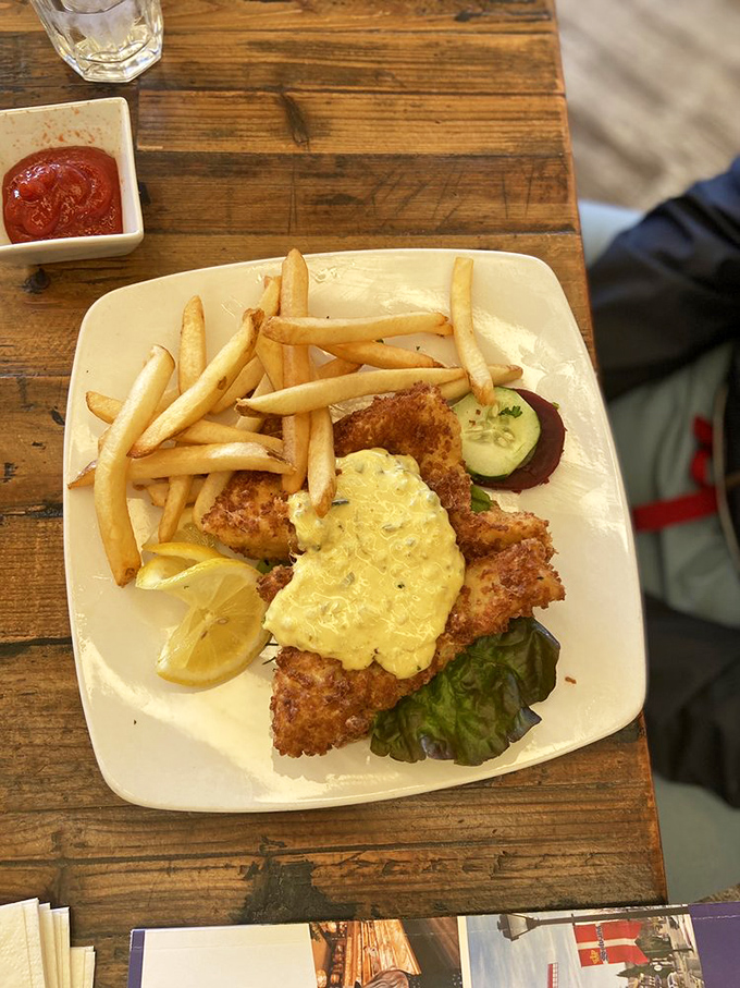 Fish and chips done right – that golden coating could make even Captain Ahab forget about whales.