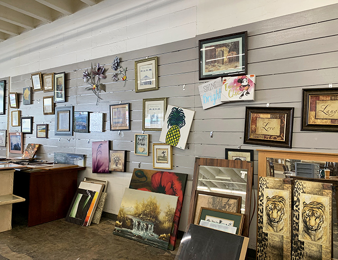 The art wall&mdash;where someone else's discarded decor becomes your home's new conversation piece. That pineapple print is practically calling your name!