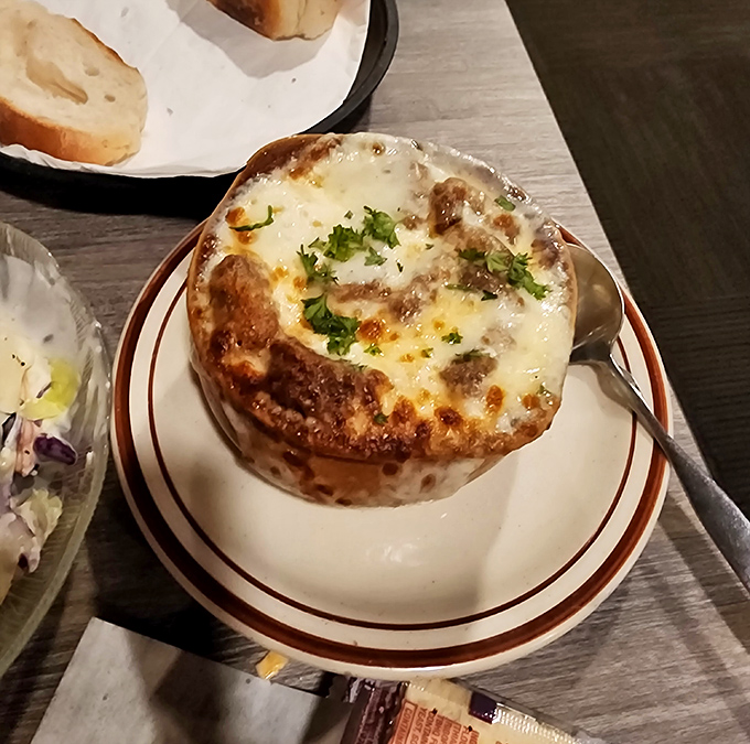 French onion soup that's crossed the border into cheese territory. That broiled crust is practically Wisconsin's state flag.