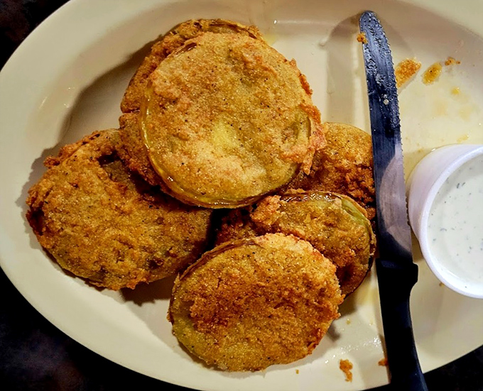 Fried green tomatoes with a golden cornmeal crust and ranch dipping sauce&mdash;a Southern classic that makes vegetables actually exciting.