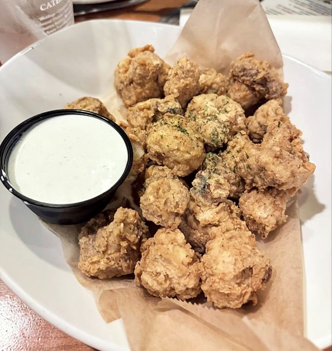 These golden-fried mushrooms have achieved the perfect crunch-to-squish ratio. That dipping sauce is just waiting to complete the relationship.
