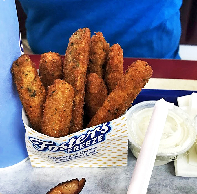 These fried zucchini sticks transform a humble garden vegetable into something your mother would actually approve of you eating.
