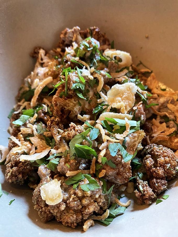 Fried cauliflower that could convert even the most dedicated vegetable skeptics. Crispy, savory, and topped with fresh herbs&mdash;vegetable nirvana.