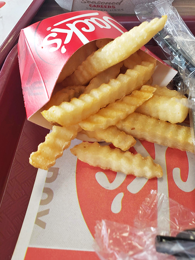 These aren't just fries; they're crispy, golden happiness sticks that make you wonder why you ever bothered with fancy potato preparations.
