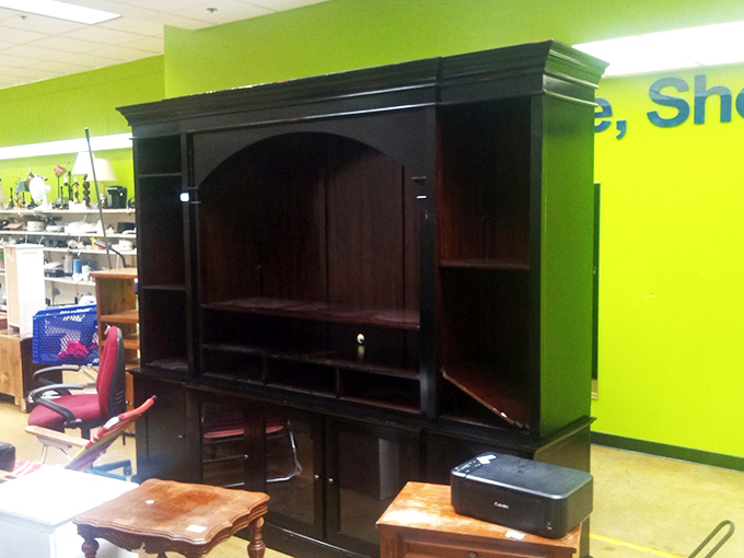 Solid wood entertainment center that would cost a fortune new. Furniture shopping here is like adopting a distinguished piece with stories to tell.