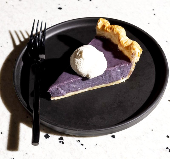 Purple pie that looks like it was harvested from some delicious corner of the galaxy, with a scoop of vanilla that's pure earthly perfection.