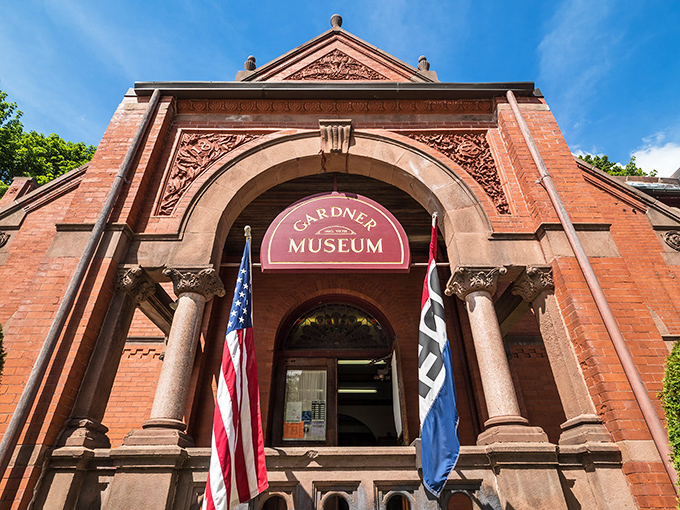 The Gardner Museum's impressive entrance stands as a gateway to the city's rich history, where chairs aren't just furniture but cultural artifacts.