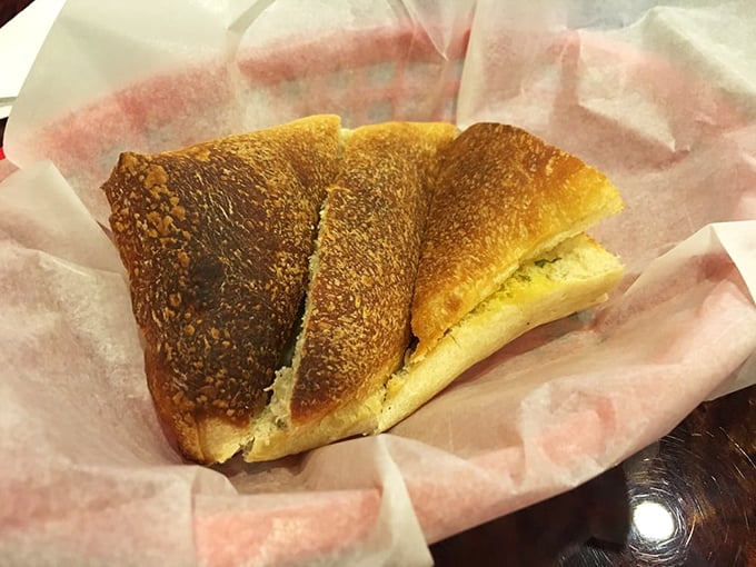 Garlic bread that's achieved the golden trifecta: crispy exterior, pillowy interior, and enough garlic to keep vampires away for a century.