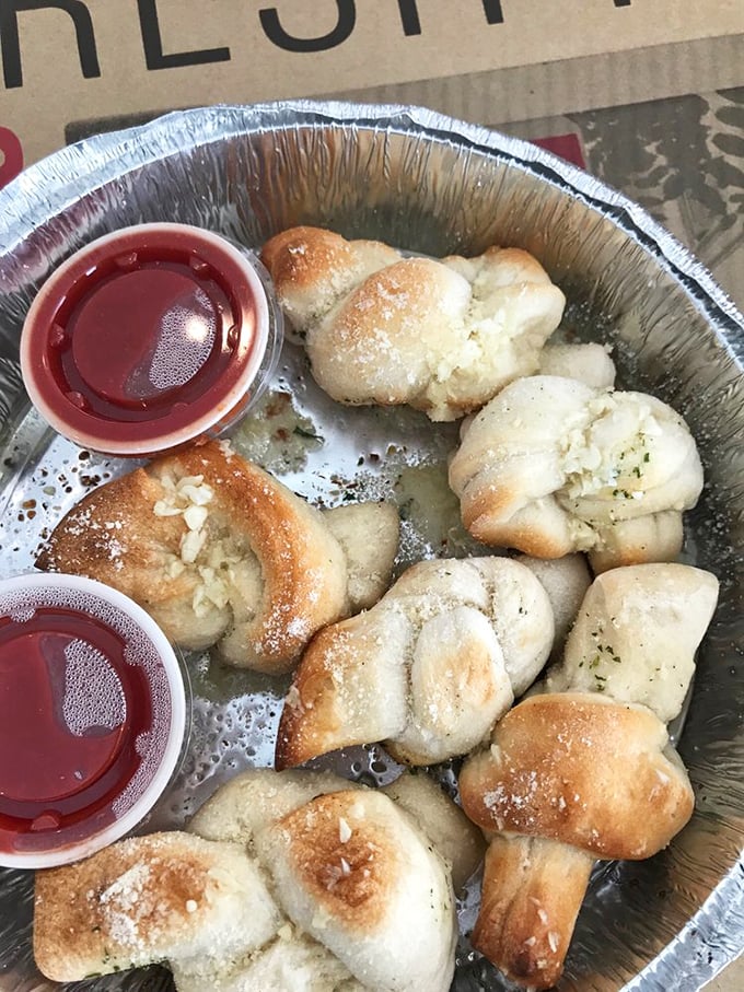 Garlic knots so buttery and aromatic, they could probably be detected from space by hungry astronauts with good taste.