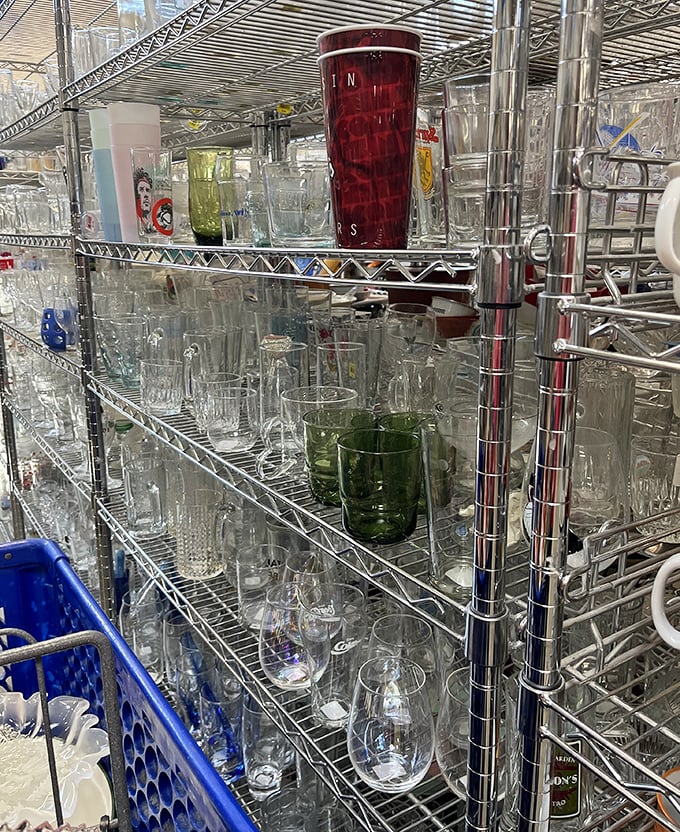 Crystal, colored glass, and everyday tumblers stand at attention. That ruby red vase might become the conversation piece your mantel has been missing.