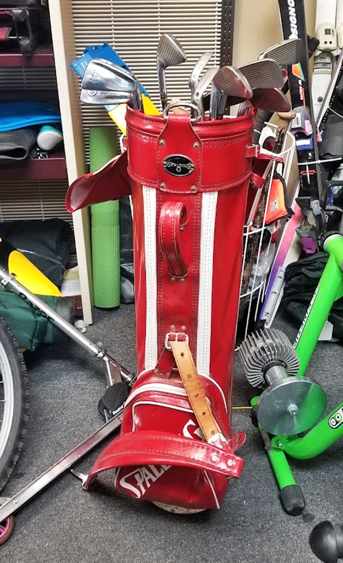 A vintage golf bag that's seen more swings than a Vegas lounge singer, ready to hit the links with its next owner.