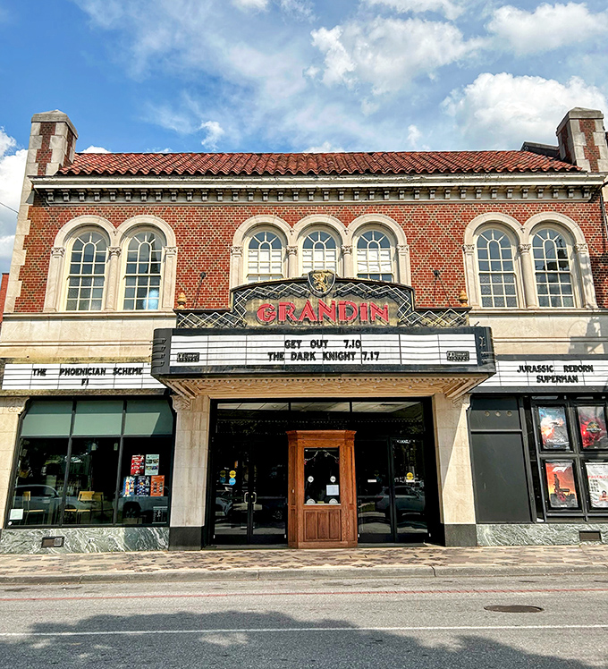The historic Grandin Theatre marquee still lights up the neighborhood, proving some entertainment experiences can't be replicated by even the fanciest home theater setup.