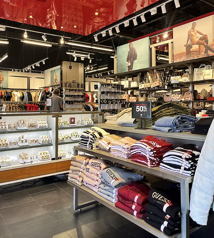 Guess what's 50% off? Everything you actually want! Perfectly folded stacks of fashion temptation arranged like a retail layer cake.