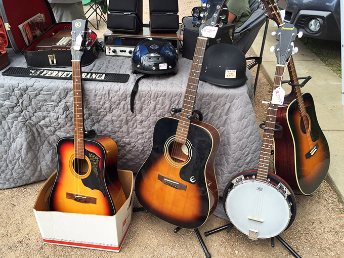 Guitars and banjos waiting for their next encore, each one a potential soundtrack to somebody's memories.