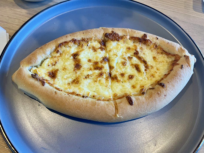 Khachapuri: where cheese meets bread in a relationship so perfect it makes Romeo and Juliet look like casual dating.