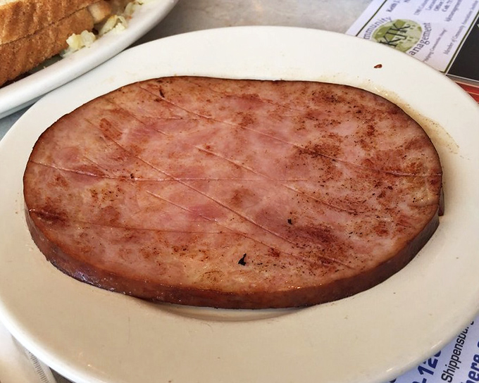 Ham steak so perfectly grilled it deserves its own ZIP code. Simple food done right is the ultimate luxury.