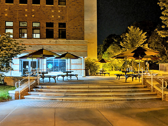 Evening transforms campus spaces into peaceful retreats where residents enjoy summer concerts and students create tomorrow's memories.