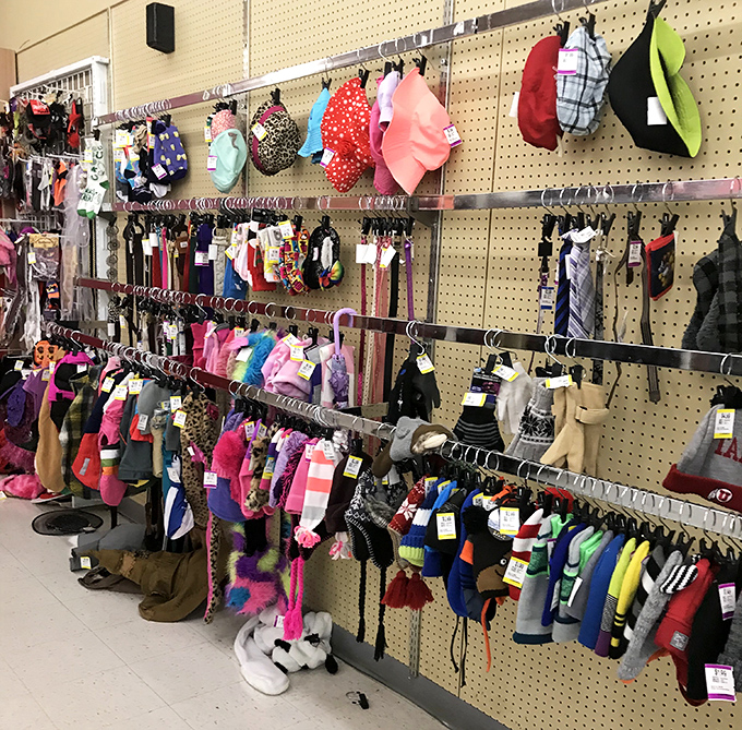 The hat and accessories wall&mdash;where winter warmth meets fashion statement. That red beanie could be your signature look for the next Utah ski season.